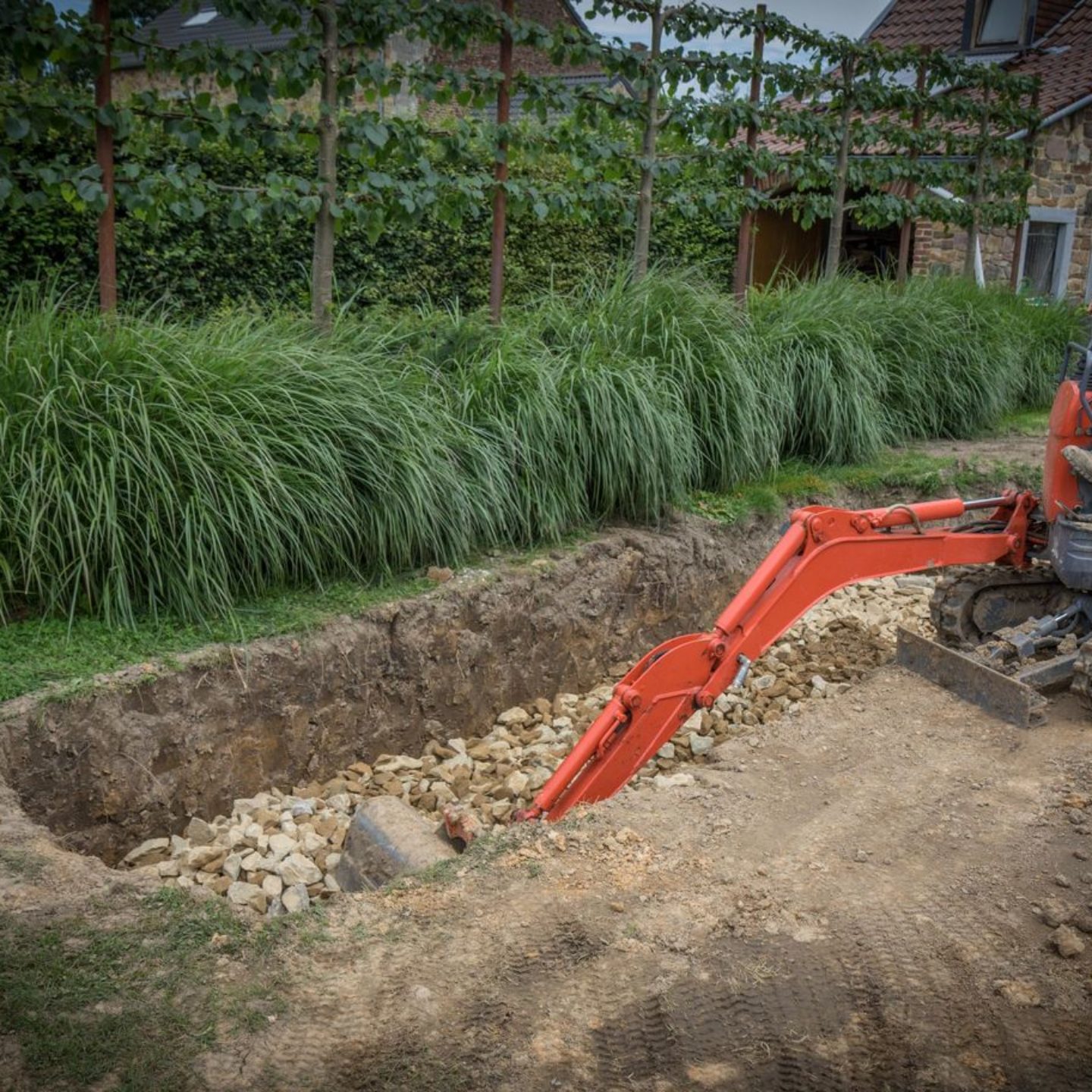 Réalisation d'un puits perdu avec drain dispersant - D-Vert