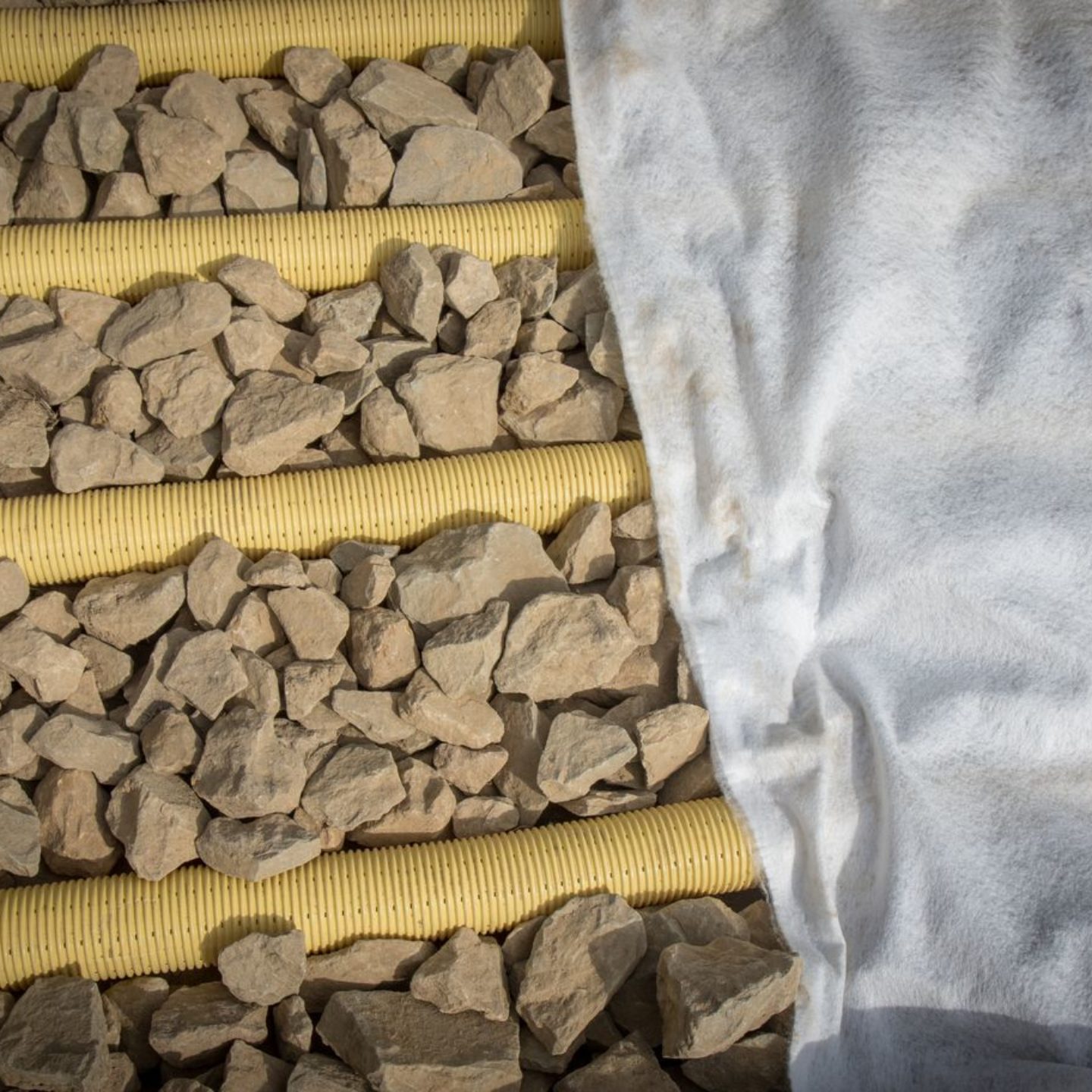 Réalisation d'un puits perdu avec drain dispersant - D-Vert